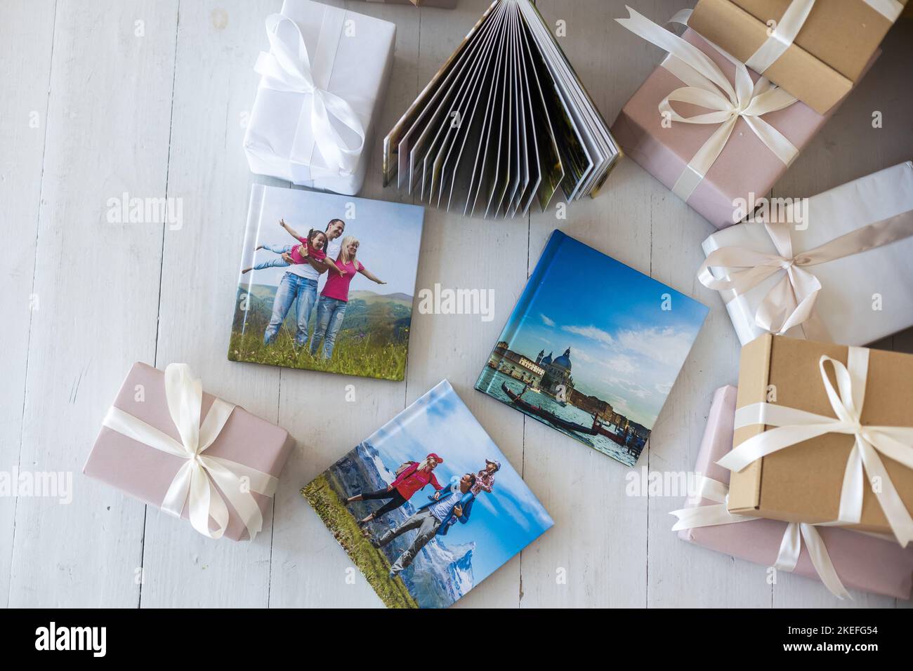 a Photobook of family. Photobook is gift. photo album next to gifts ...