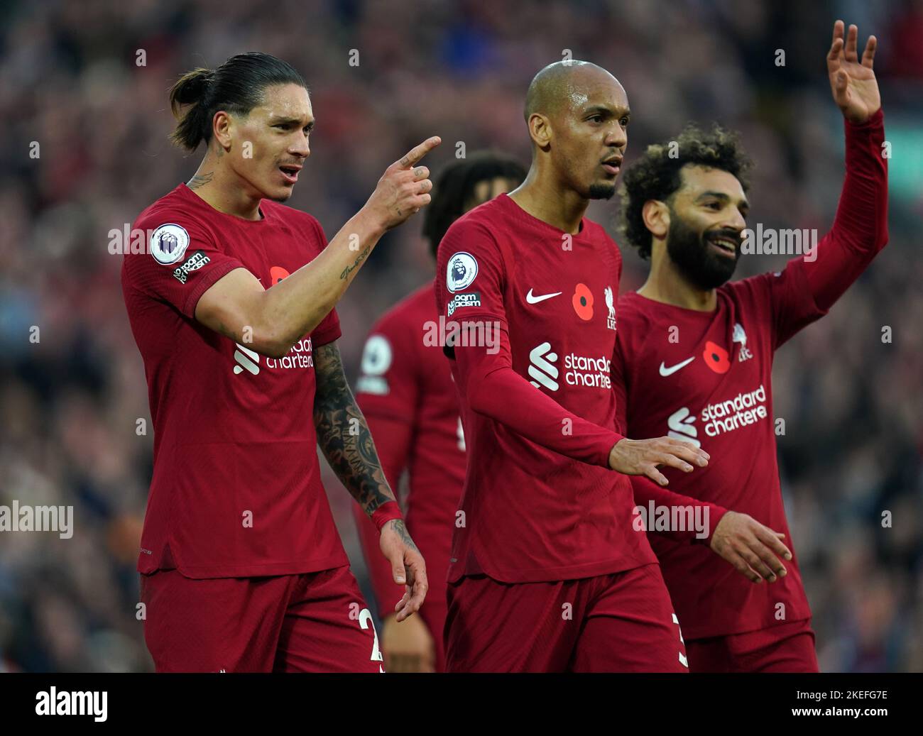 Liverpool's Darwin Nunez (left) celebrates scoring their side's third ...