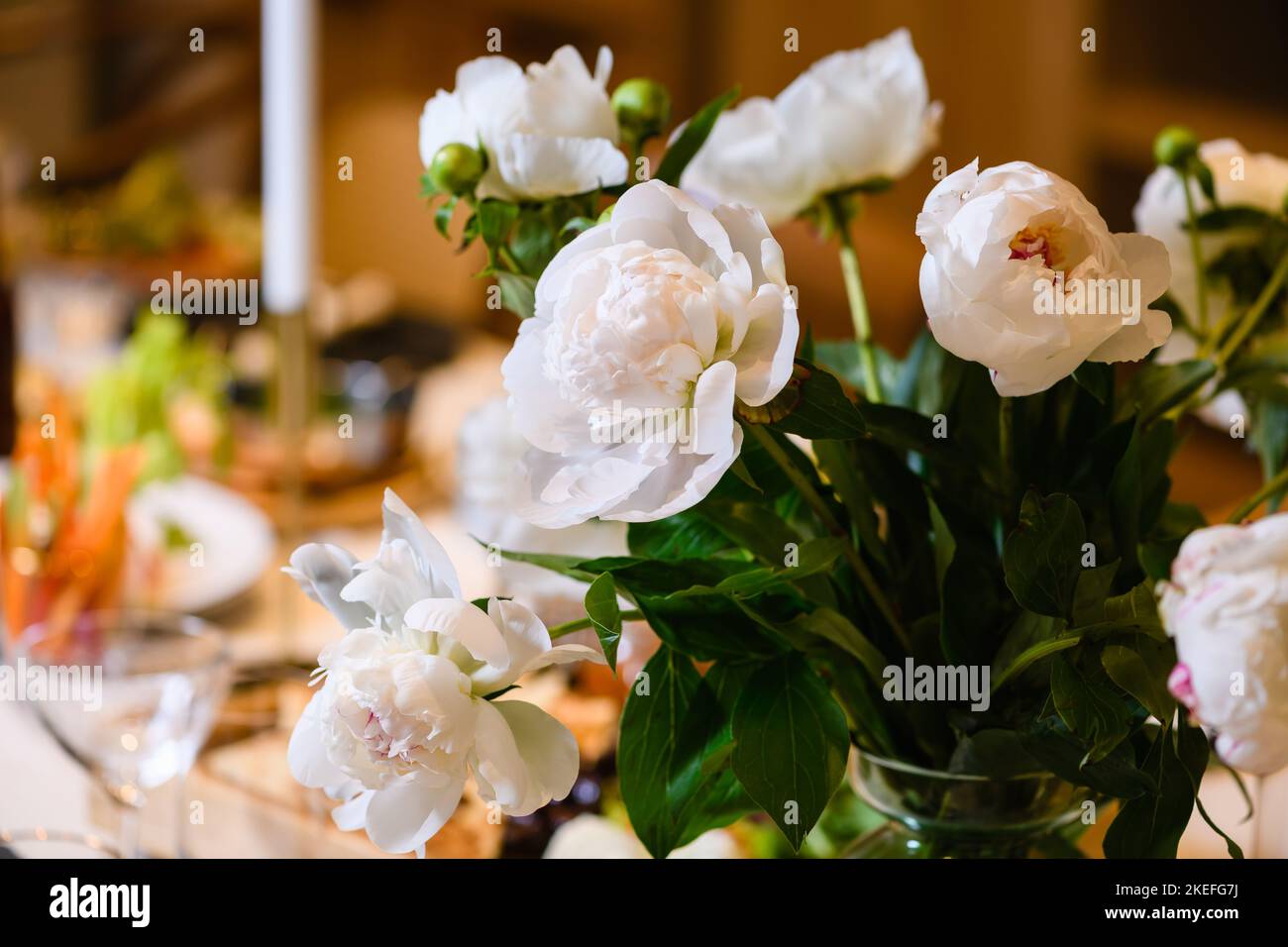 Close-up of peonies flowers at banquet table, beautiful elegant floral ...