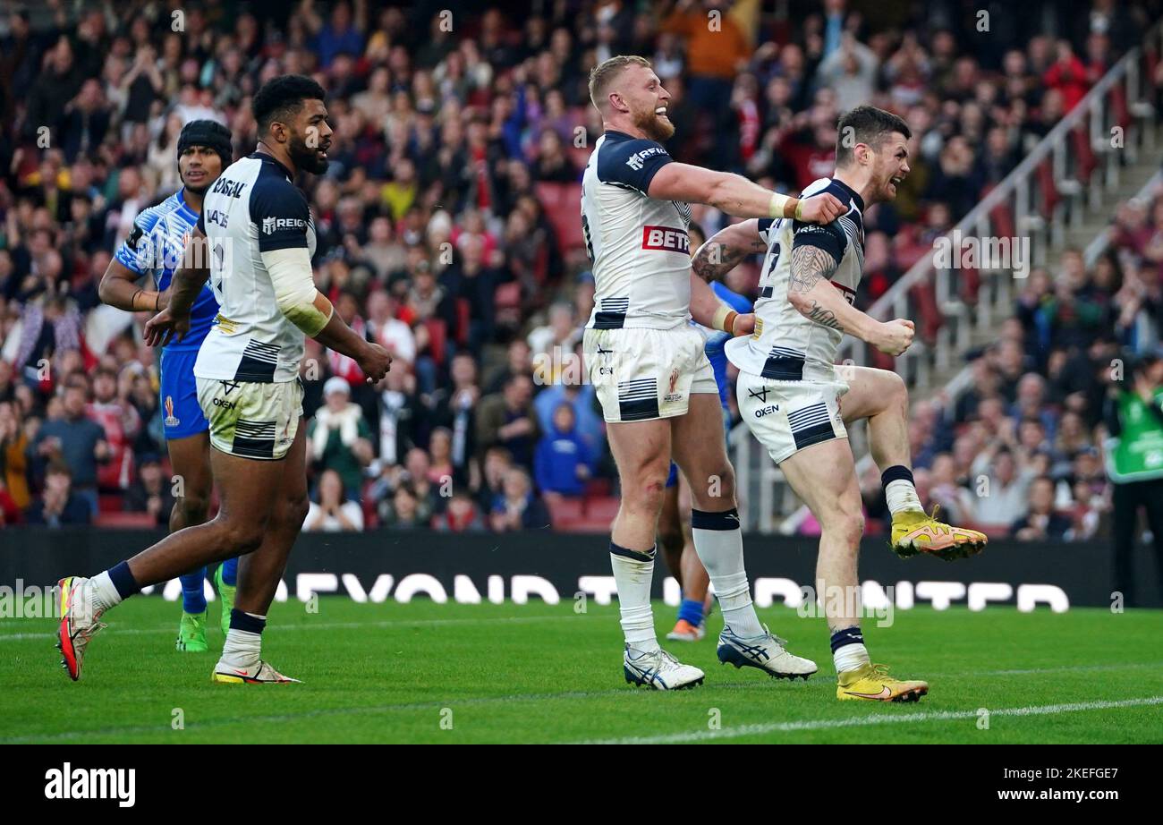 England's John Bateman celebrates scoring his sides second try during ...