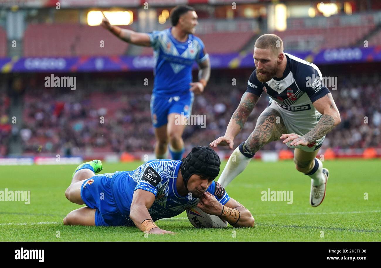 Samoa's Stephen Crichton dives in to score his sides third try during ...