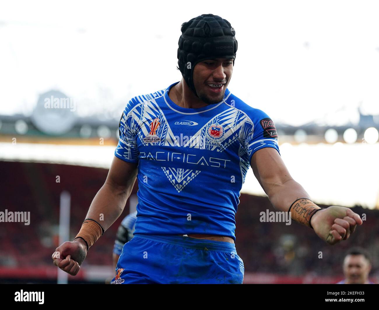 Samoa's Stephen Crichton celebrates scoring his sides third try during ...