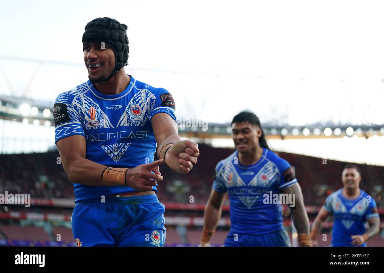 Samoa's Stephen Crichton celebrates scoring his sides third try during ...