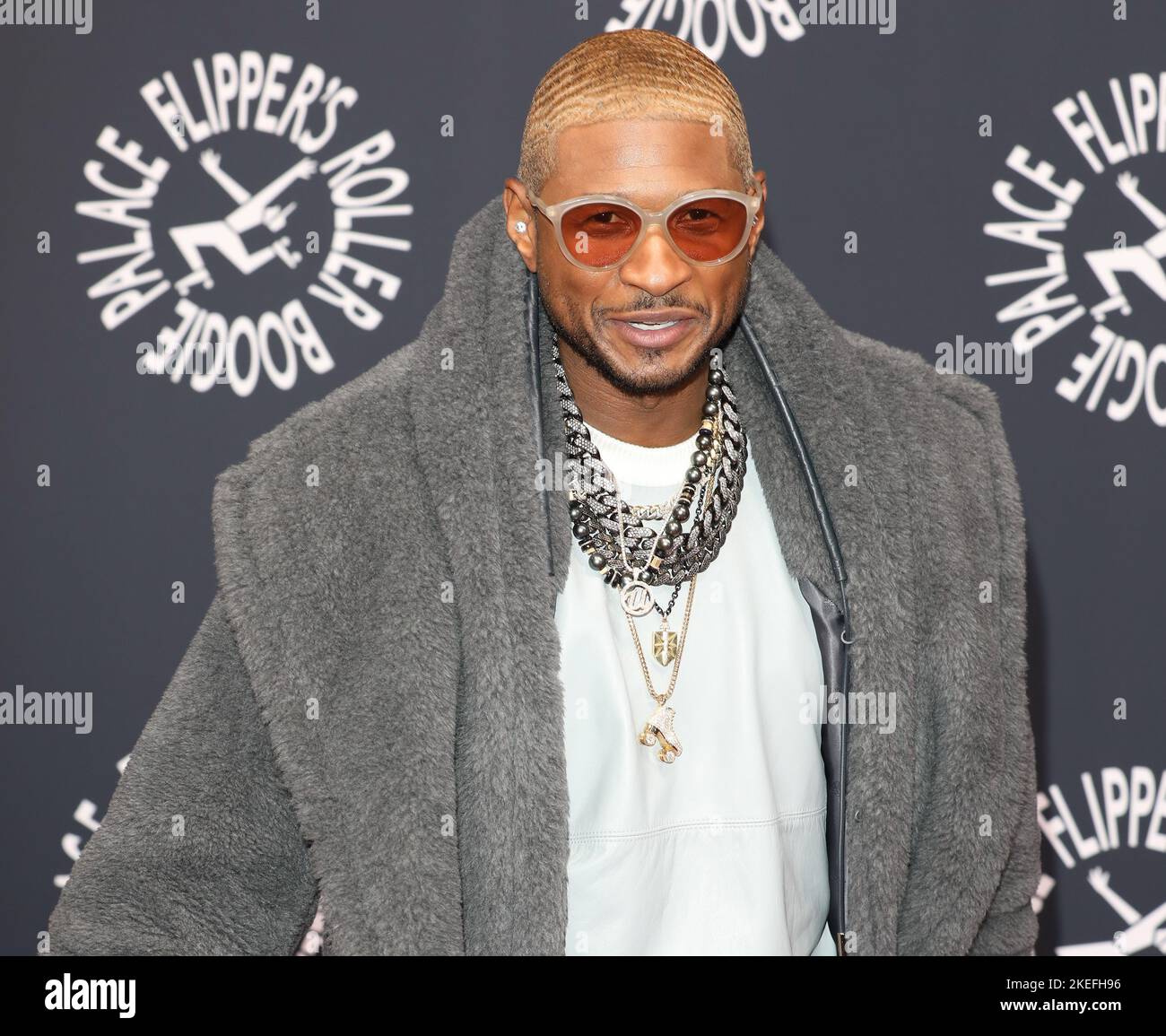 Usher attends the Opening of Flipper's Roller Boogie Palace in London ...