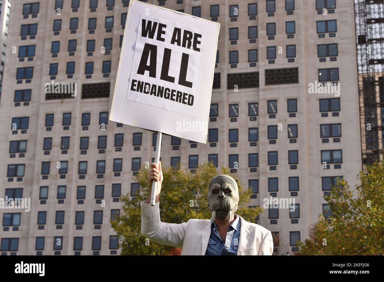 London, England, UK. 12th Nov, 2022. Activist with walrus mask holds a ...