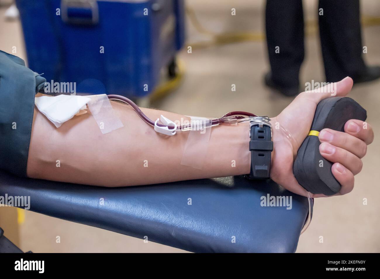 A person giving blood at a blood drive in New Bern, North Carolina ...