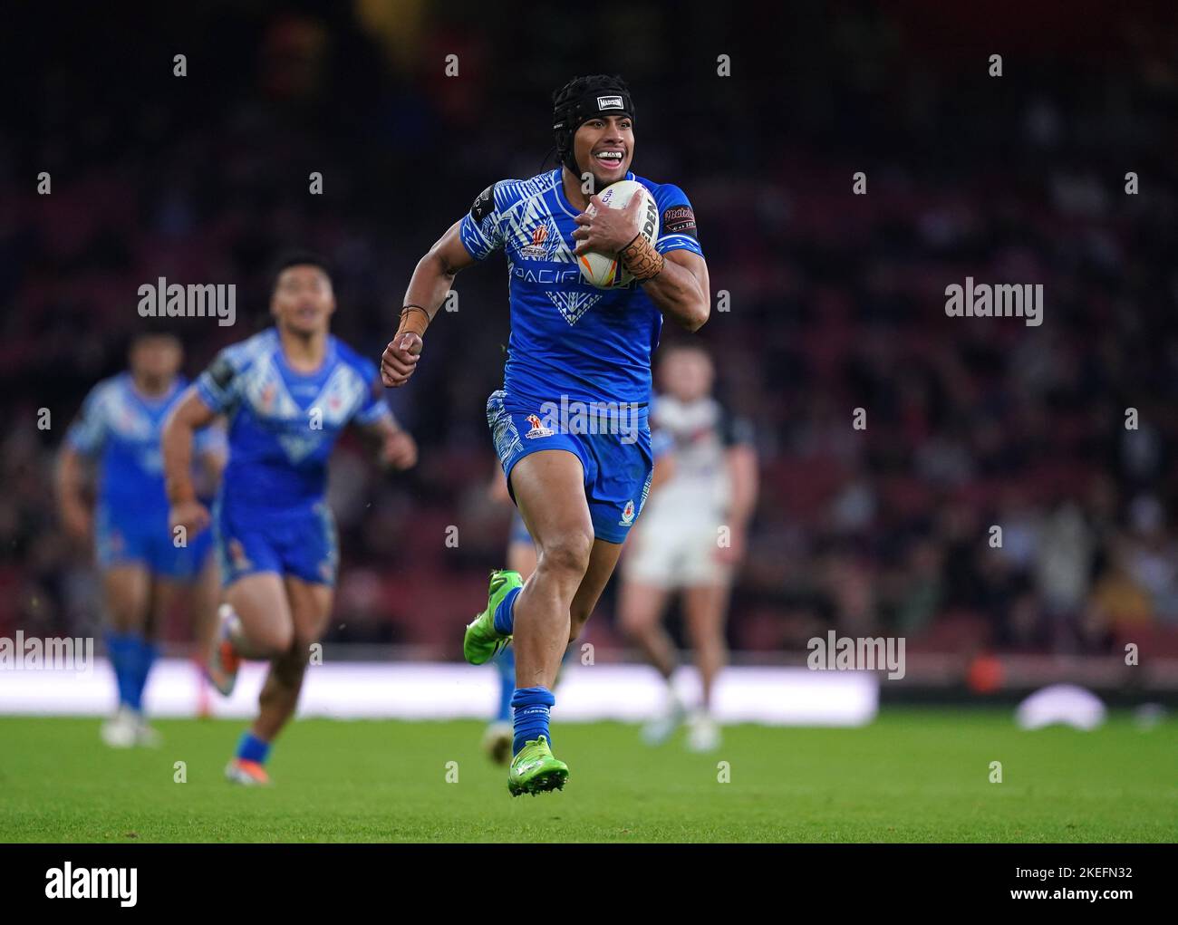 Samoa's Stephen Crichton runs in to score his sides fourth try during ...