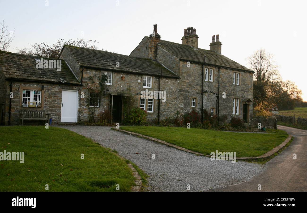 A view of the pretty cottages in the village of Downham, Clitheroe ...