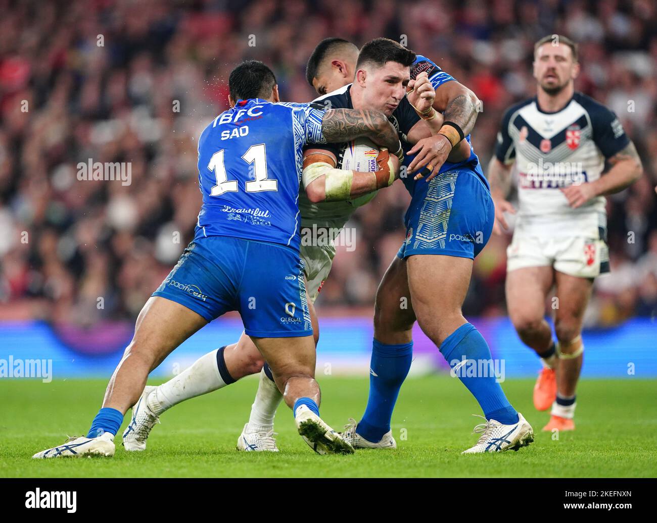 England's Victor Radley is tackled by Samoa's Ligi Sao during the Rugby ...