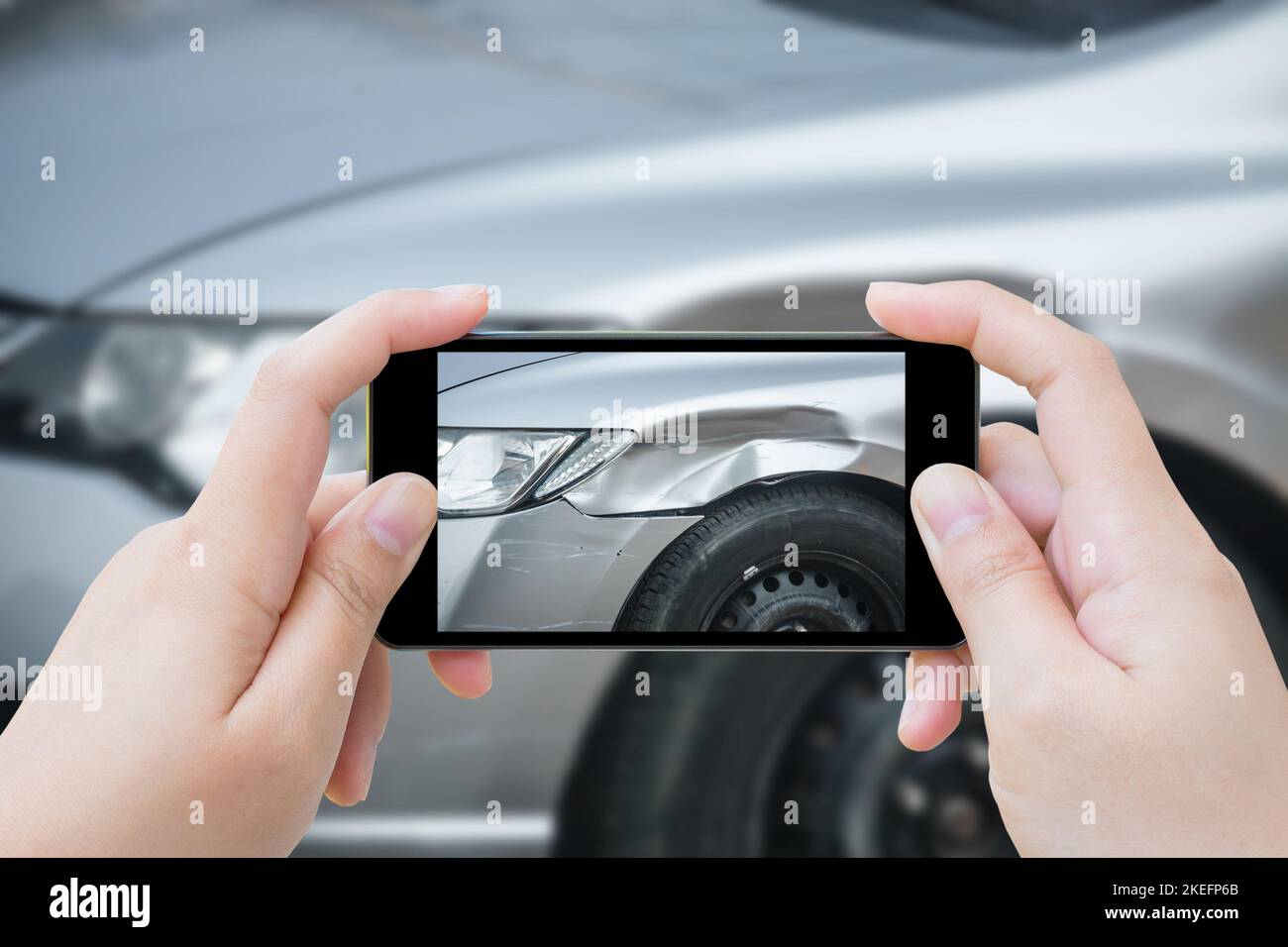 woman using mobile smartphone take photo car crash accident of the ...
