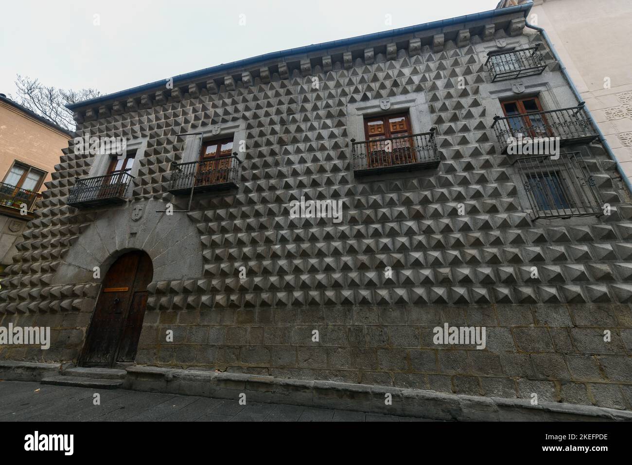 Casa de los Picos with its facade covered by granite blocks carved into ...