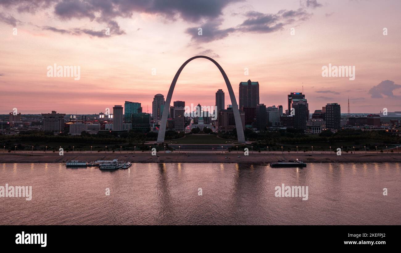 An aerial scenic shot of the Gateway Arch from across the river ...