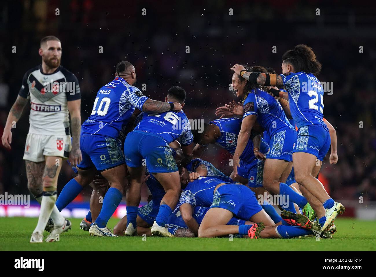 Samoa celebrate winning the Rugby League World Cup semi-final match at ...