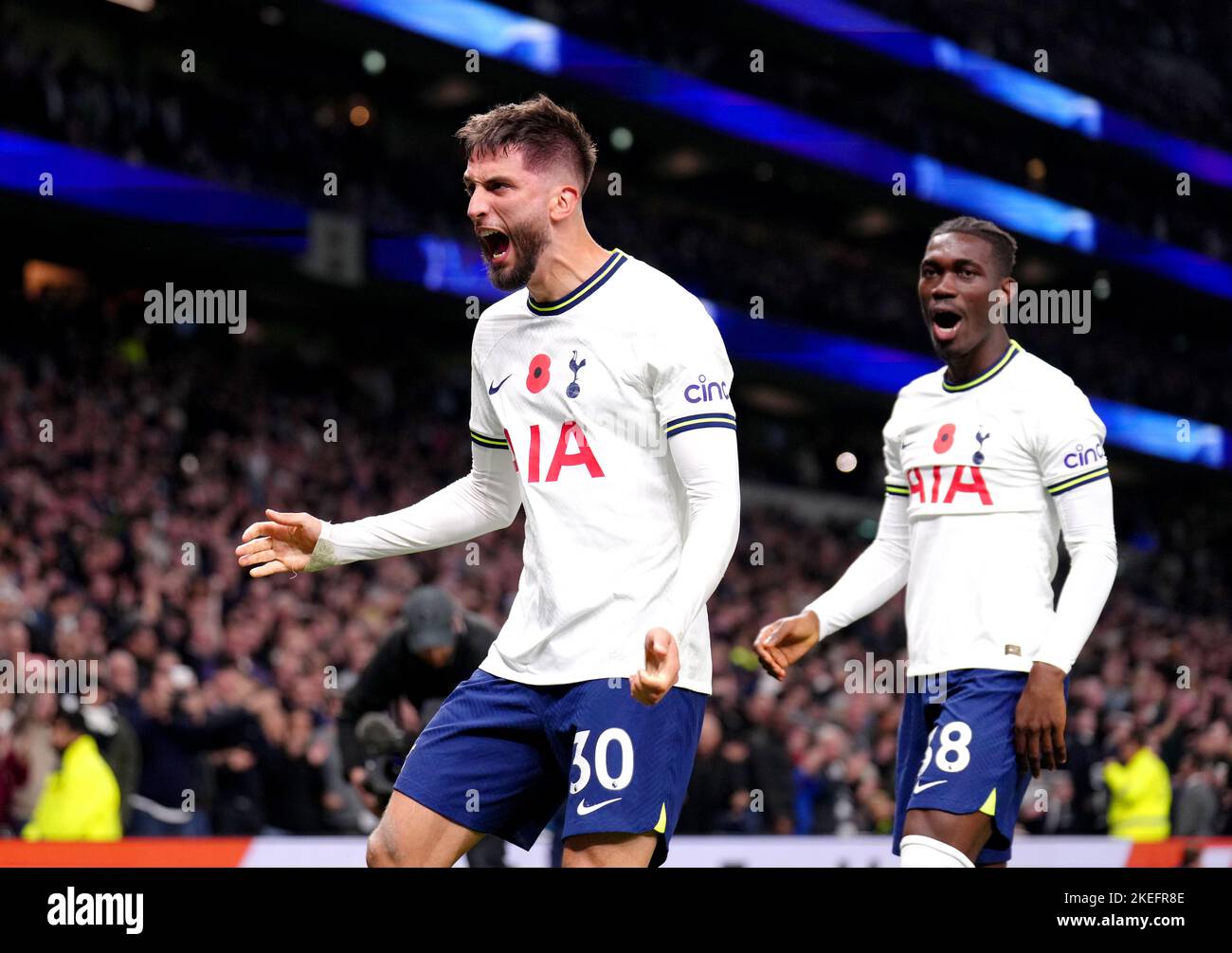 Tottenham Hotspur's Rodrigo Bentancur (left) celebrates scoring their ...