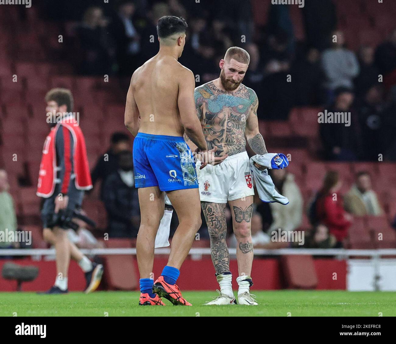 Sam Tomkins of England and Joseph Suaalii of Samoa swaps shirts during ...