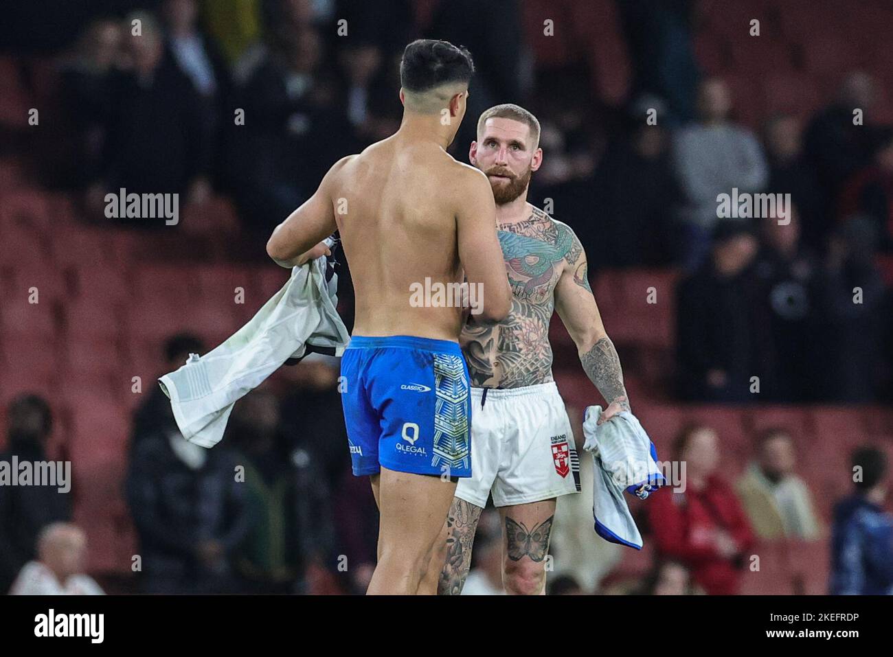 Sam Tomkins of England and Joseph Suaalii of Samoa swaps shirts during ...