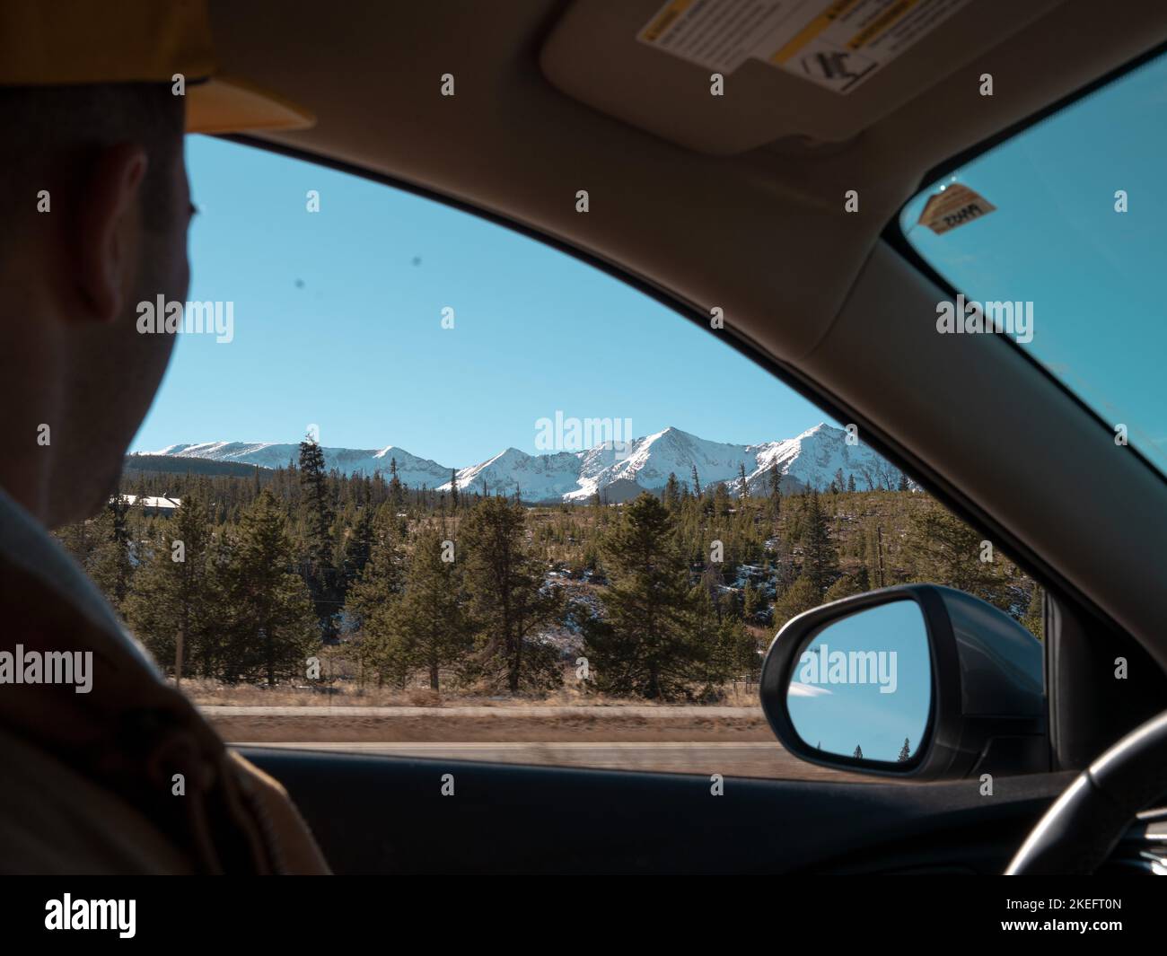 A Caucasian male riding a car in a countryside area Stock Photo - Alamy