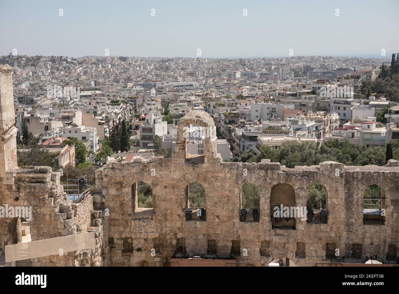 Ancient Greek ruins in Athens, Greece, Europe. Odeon of Herodes Atticus overlooking city. This ...