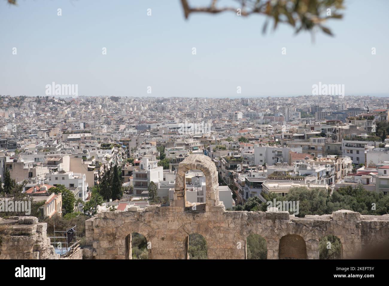 Ancient Greek ruins in Athens, Greece, Europe. Odeon of Herodes Atticus overlooking city. This ...