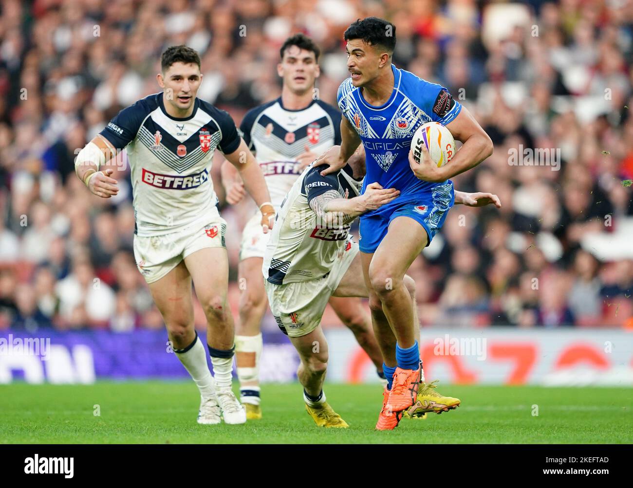 Samoa's Joseph Suaali'i is tackled during the Rugby League World Cup ...