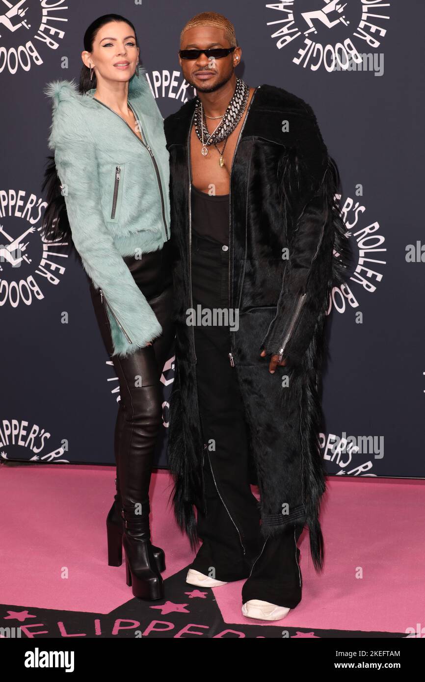 Liberty Ross and Usher attends the Opening of Flipper's Roller Boogie ...