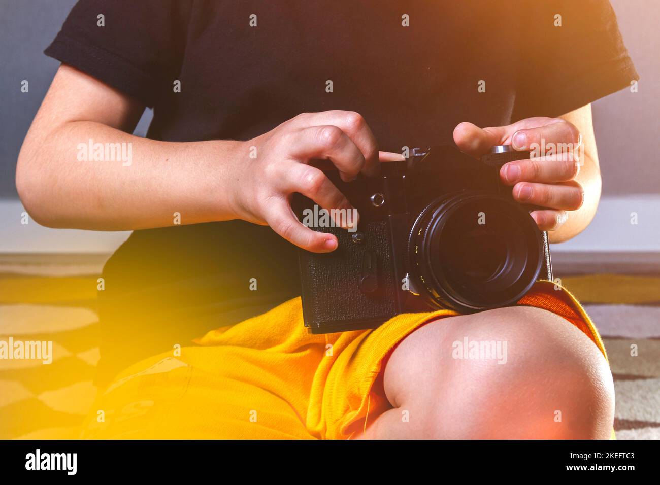 Baby and vintage camera. Beginner photographer. Photography courses ...