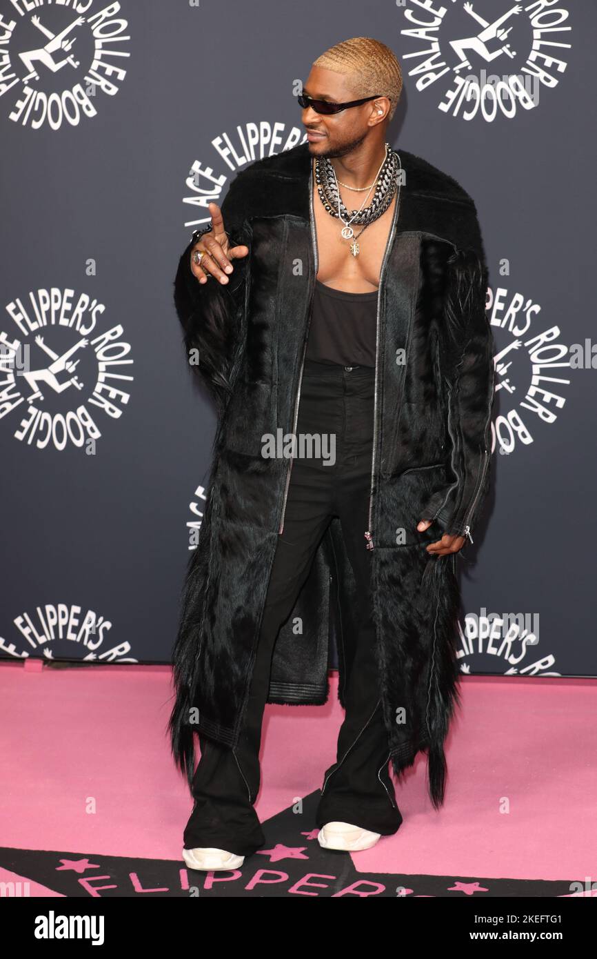 Usher attends the Opening of Flipper's Roller Boogie Palace in London ...
