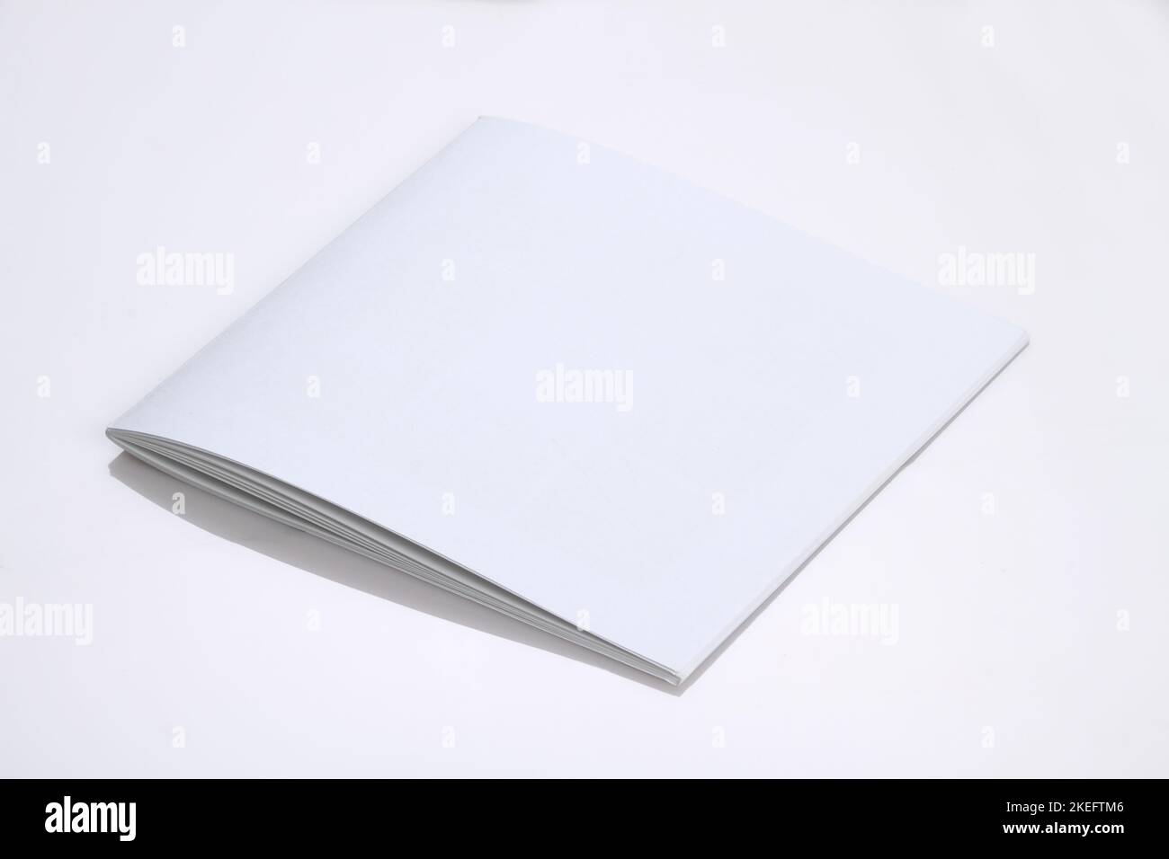 Folded White Blank Brochure Magazine Cover for Mockups Stock Photo - Alamy