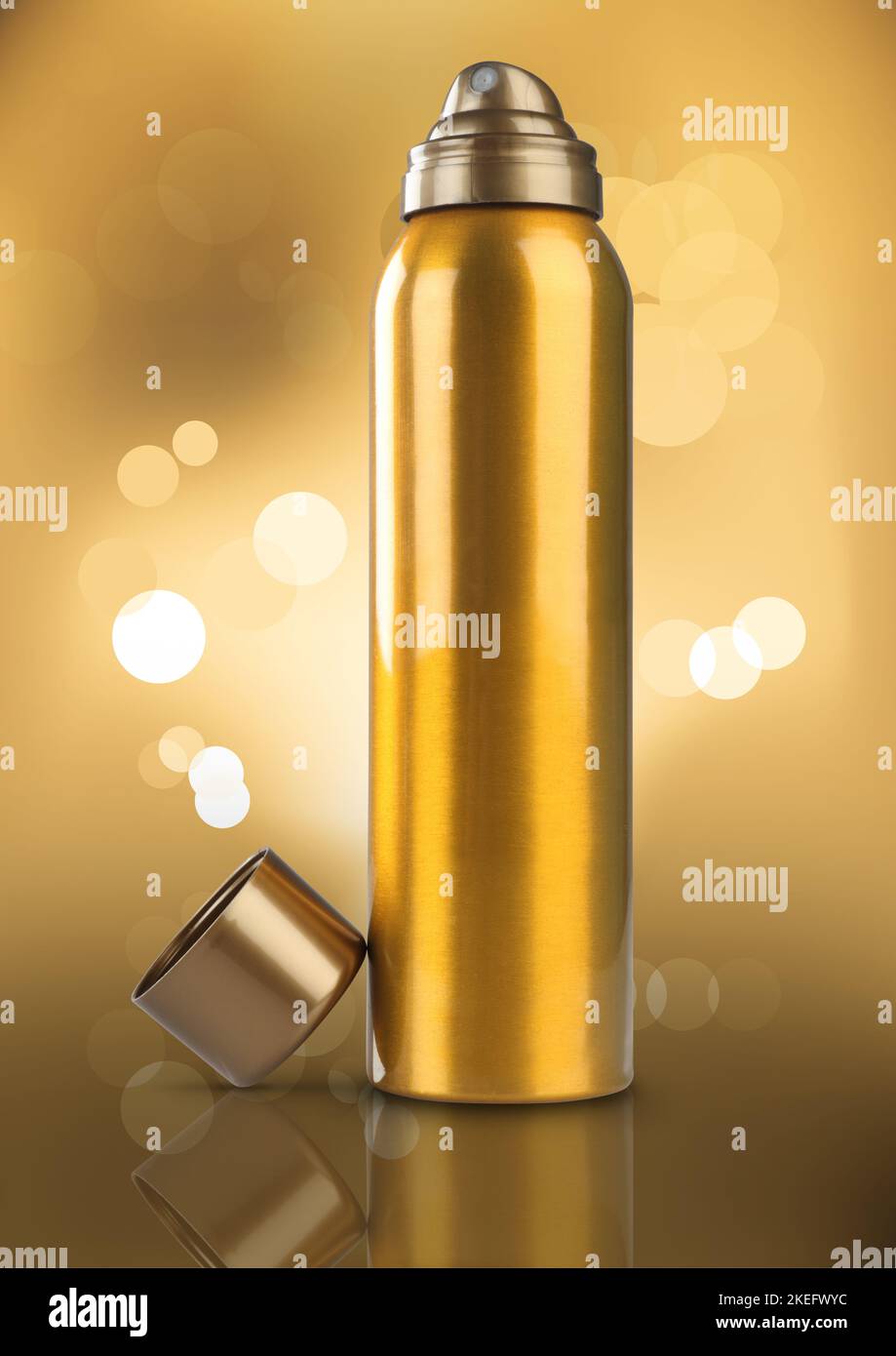 Gold Deodorant Perfume Can or Bottle Bokeh Background Stock Photo - Alamy