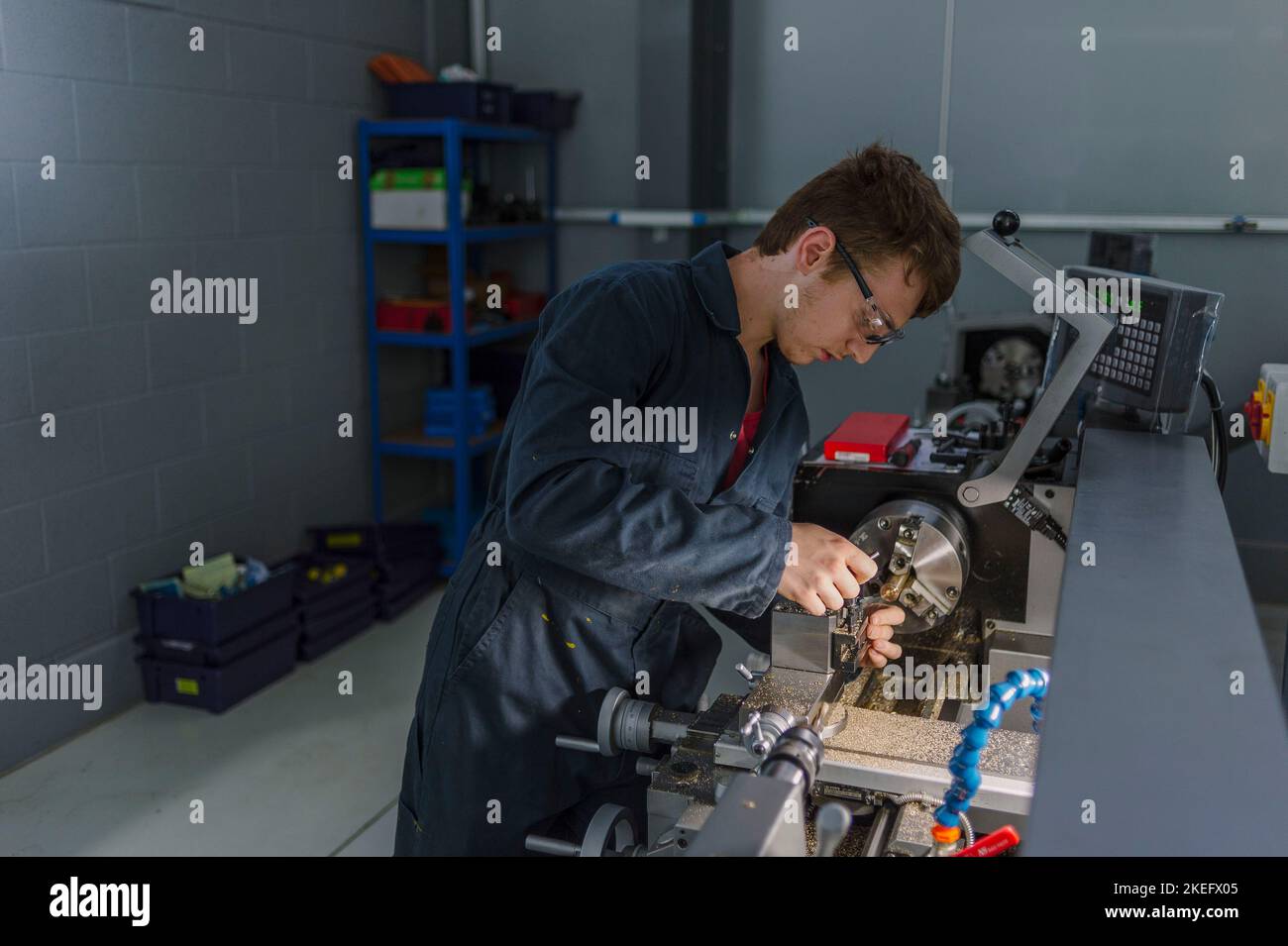 An Engineering student using tools in an engineering centre, college ...