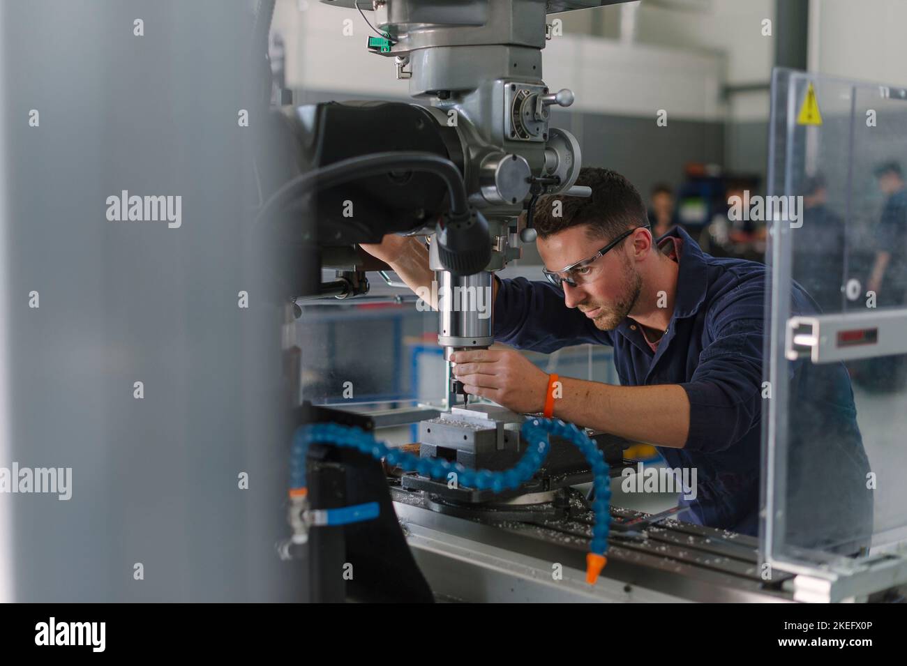 An Engineering student using tools in an engineering centre, college ...