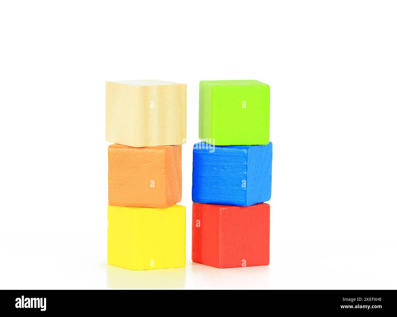 A closeup of colorful wooden blocks for children on a white background ...