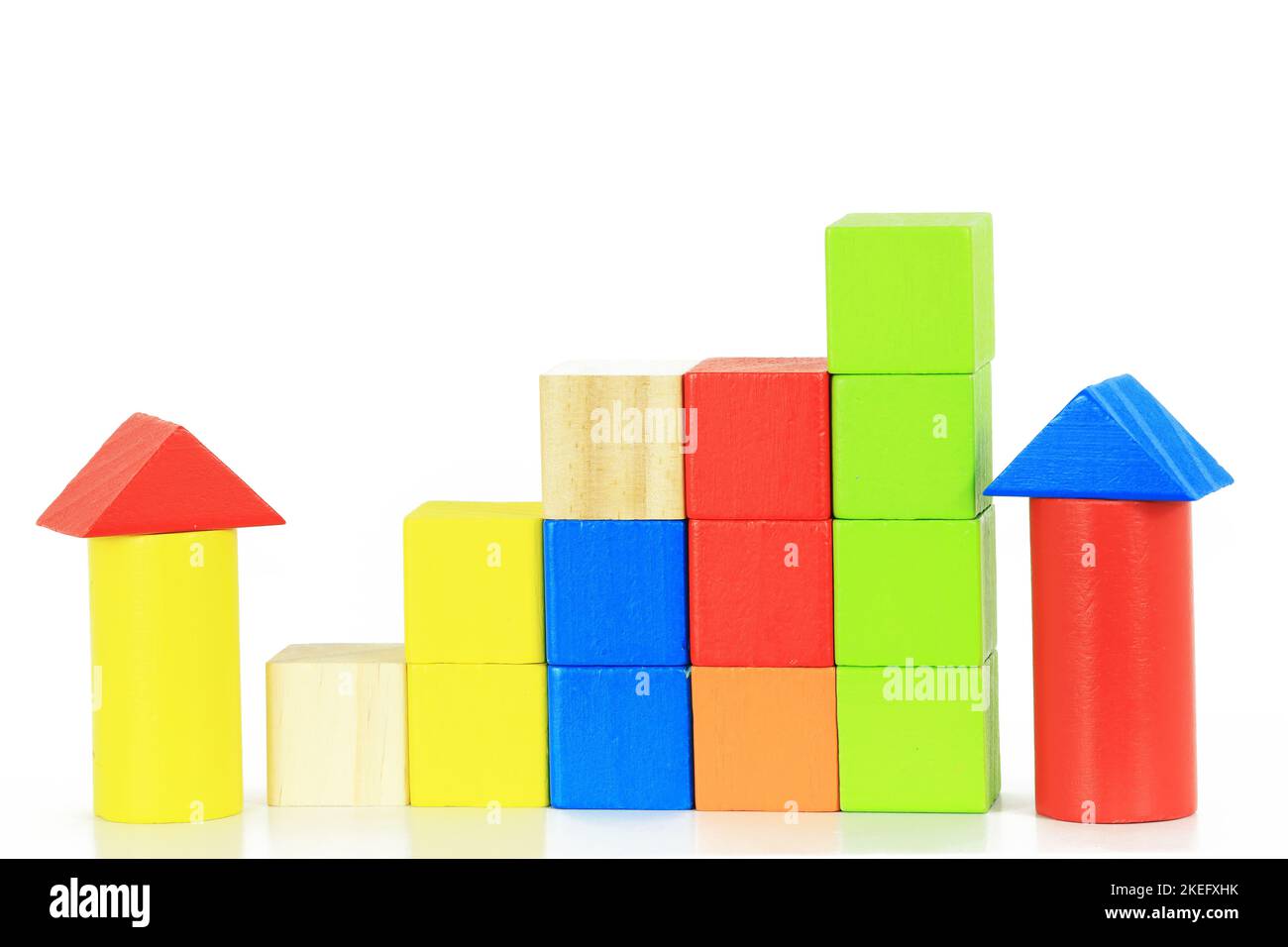 A closeup of colorful wooden blocks for children on a white background ...