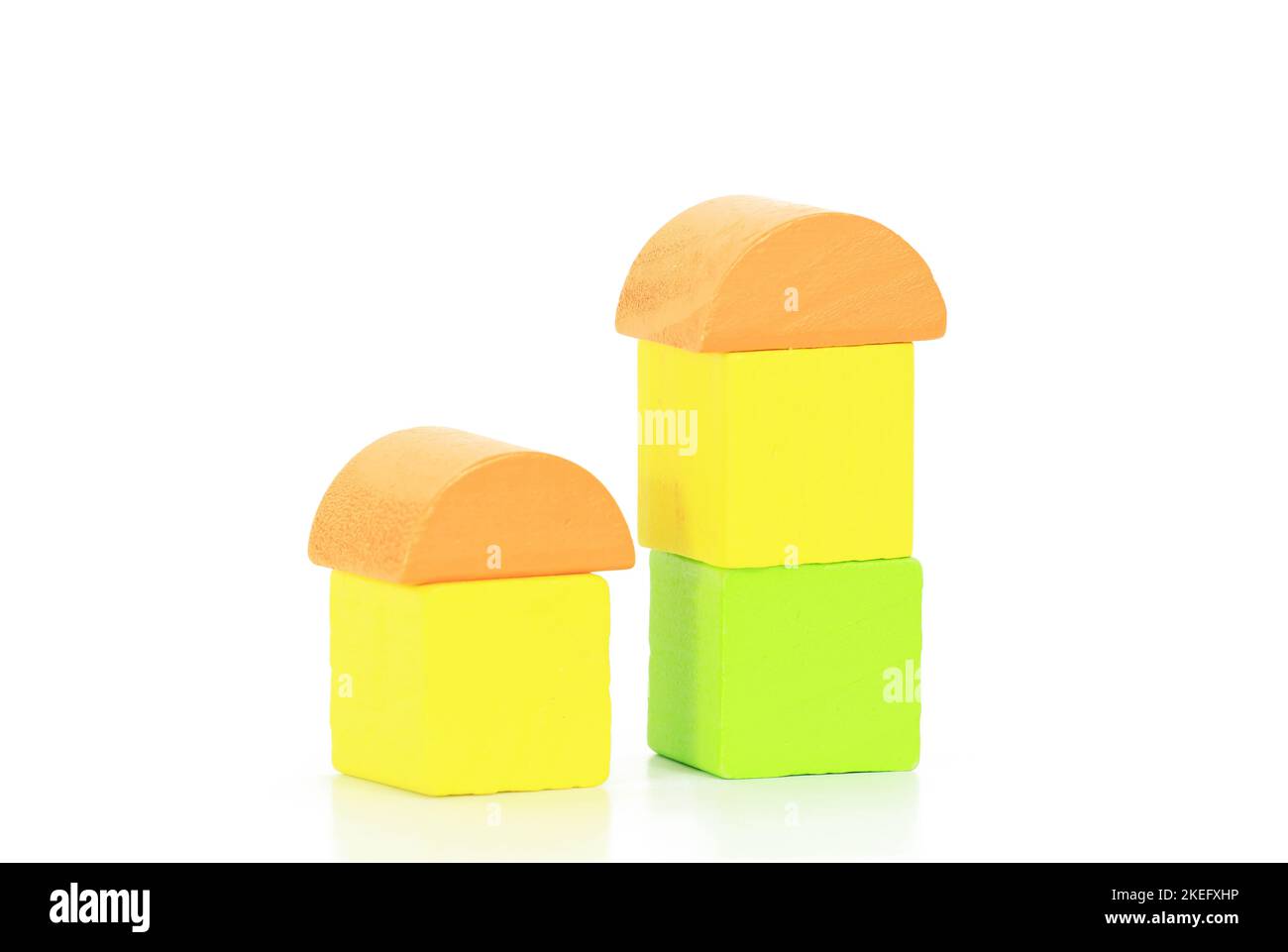 A closeup of colorful wooden blocks for children on a white background ...