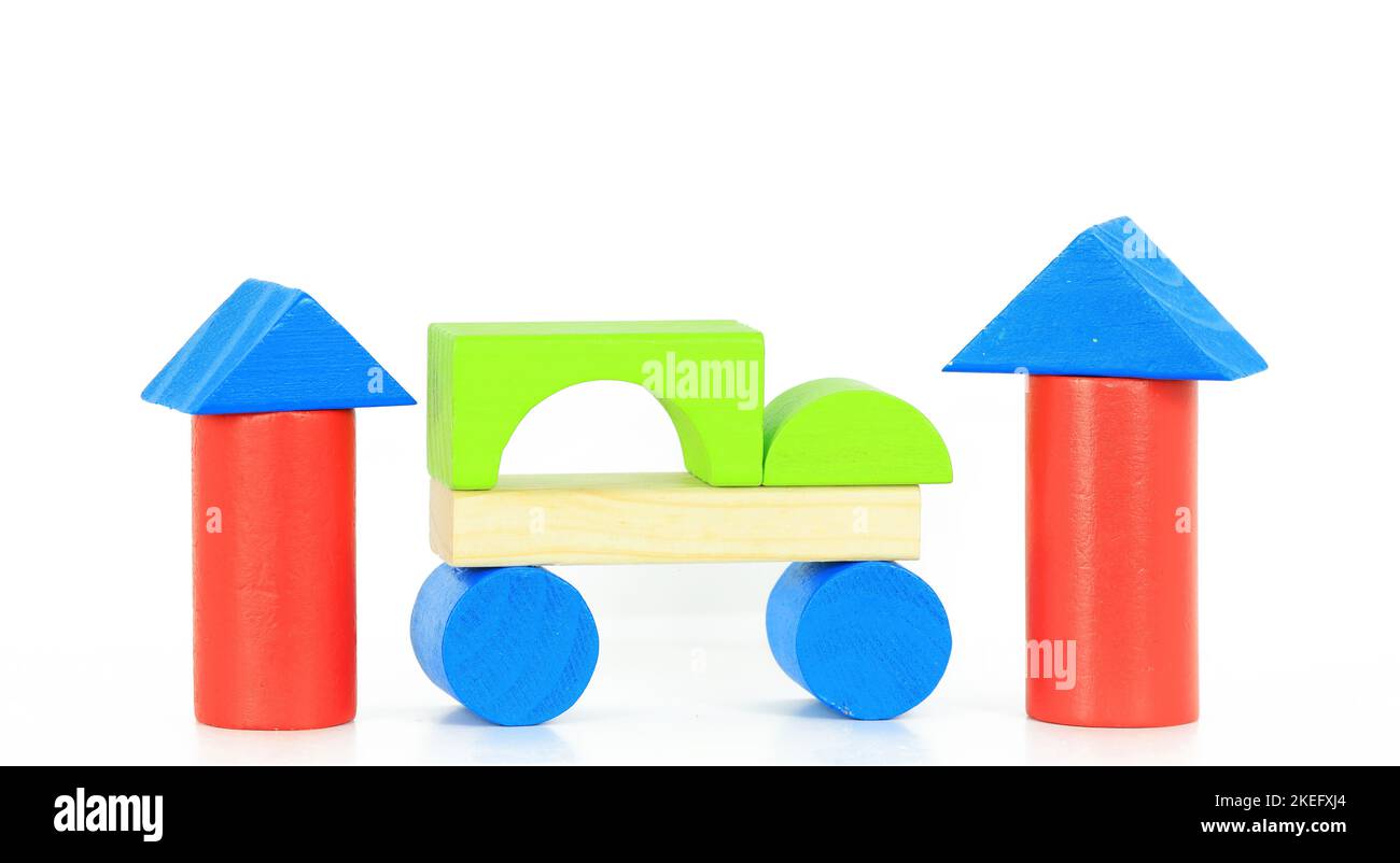 A closeup of colorful wooden blocks for children on a white background ...