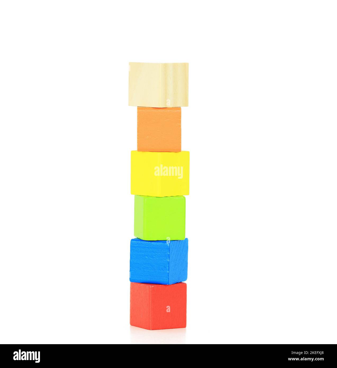 A closeup of colorful wooden blocks for children on a white background ...