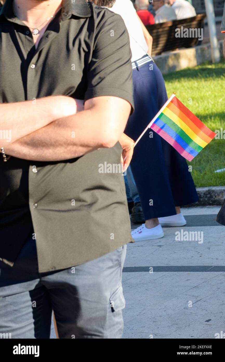 Person holding a gay pride flag hi-res stock photography and images - Alamy