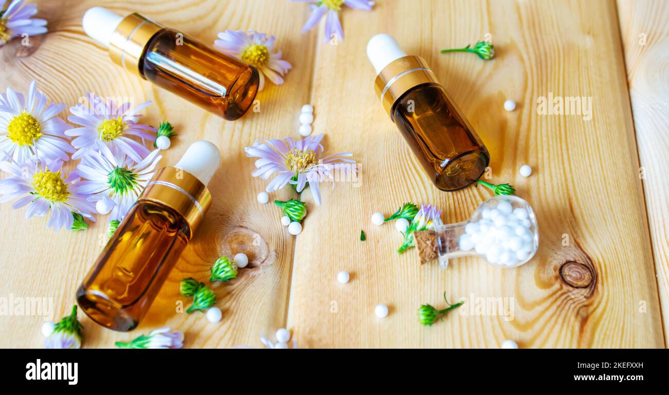 flower oil in glass bottles.homeopathy.selective focus.nature Stock ...