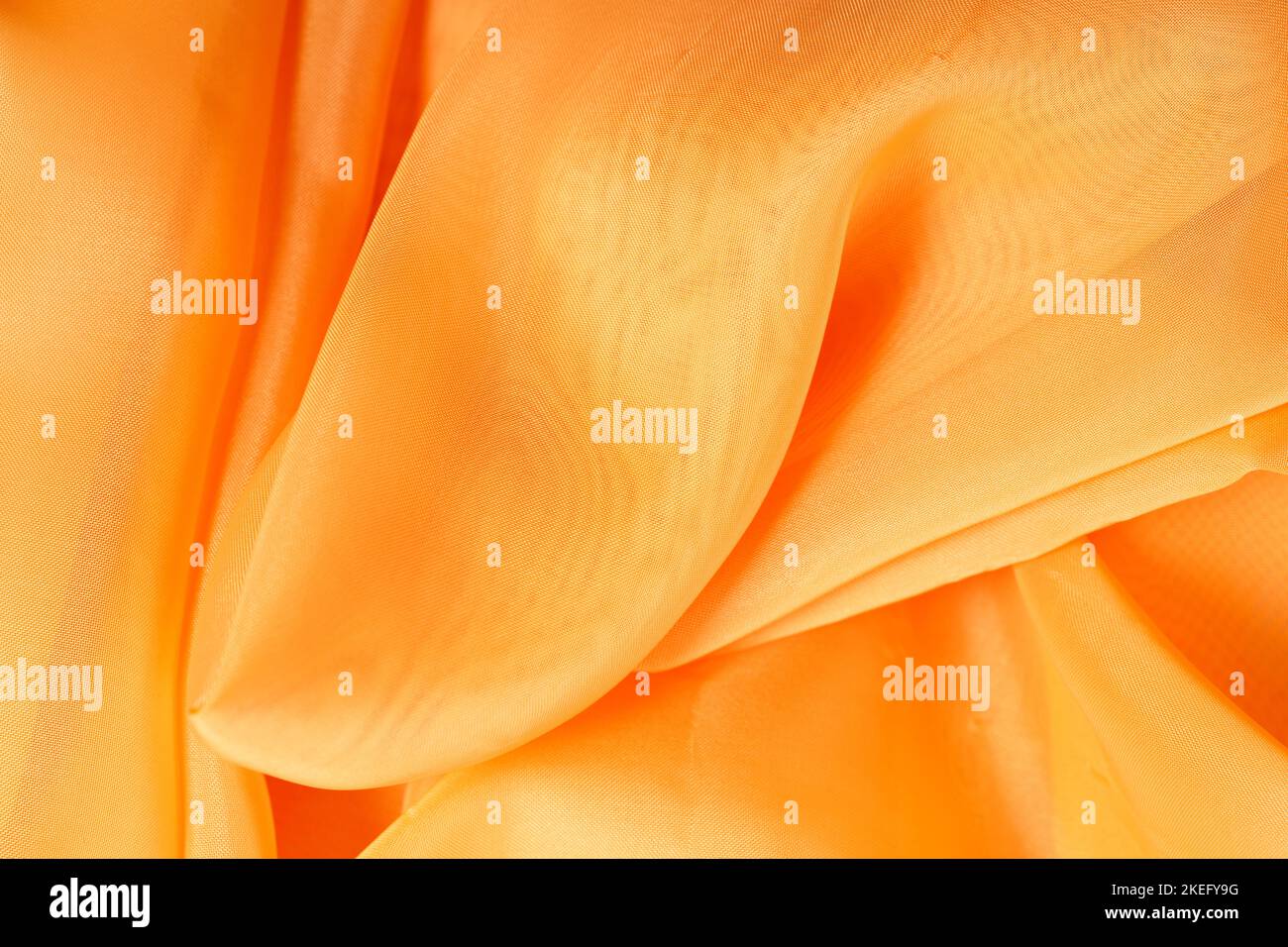 orange silk fabric. fabric texture wavy. High quality photo Stock Photo ...