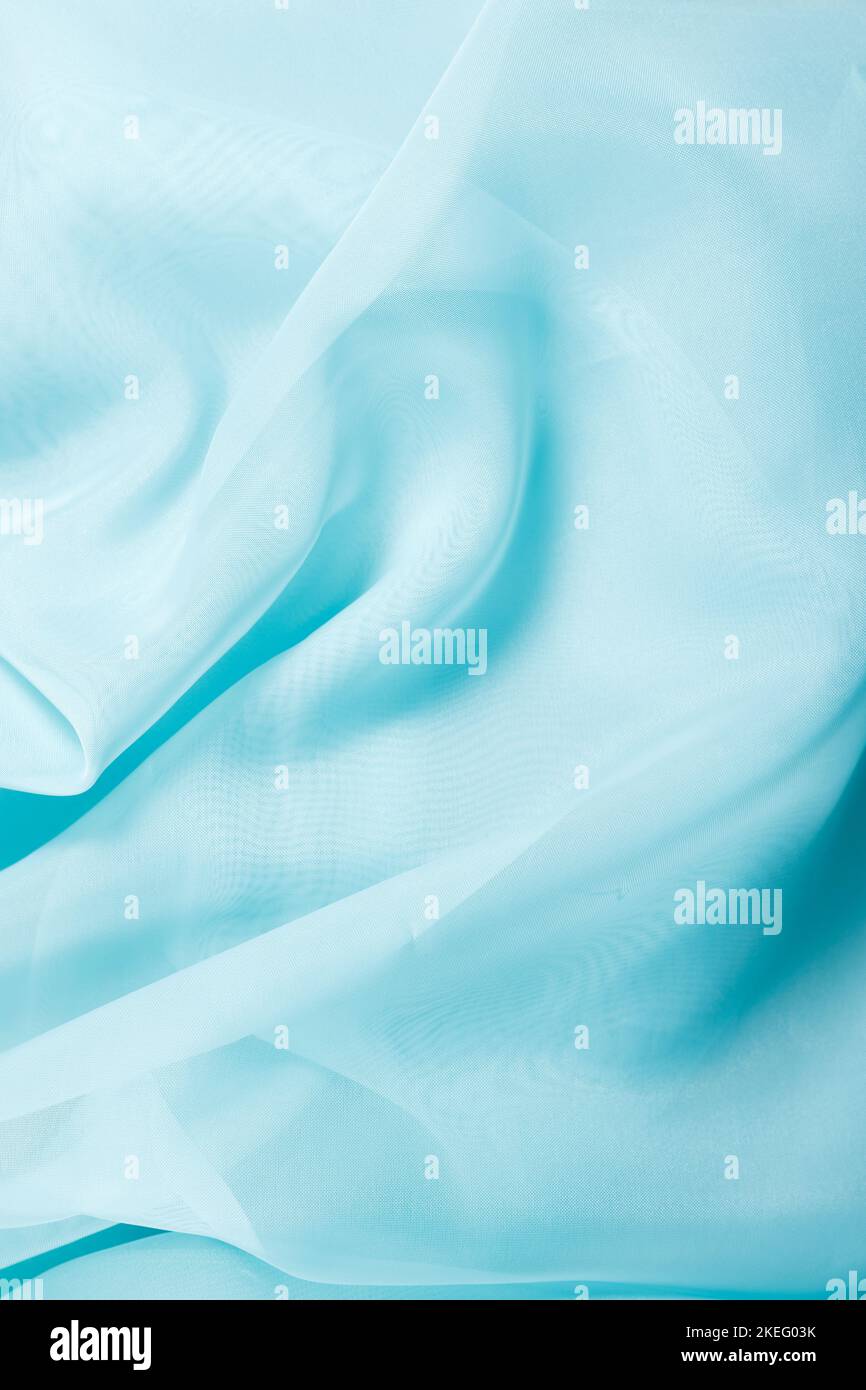 blue silk fabric. wavy fabric texture Stock Photo - Alamy