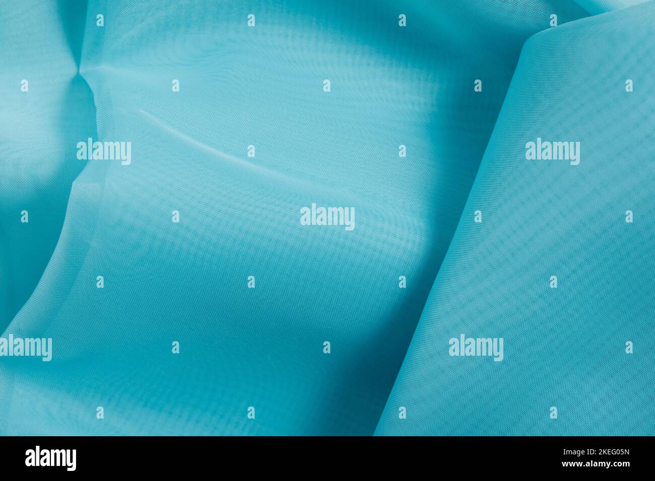 blue silk fabric. wavy fabric texture Stock Photo - Alamy