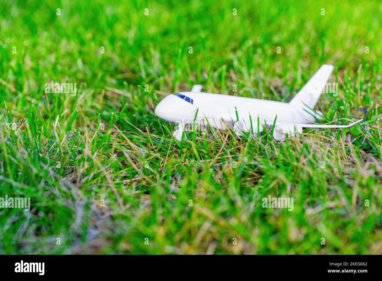 White modern plane model parked in the field Stock Photo - Alamy