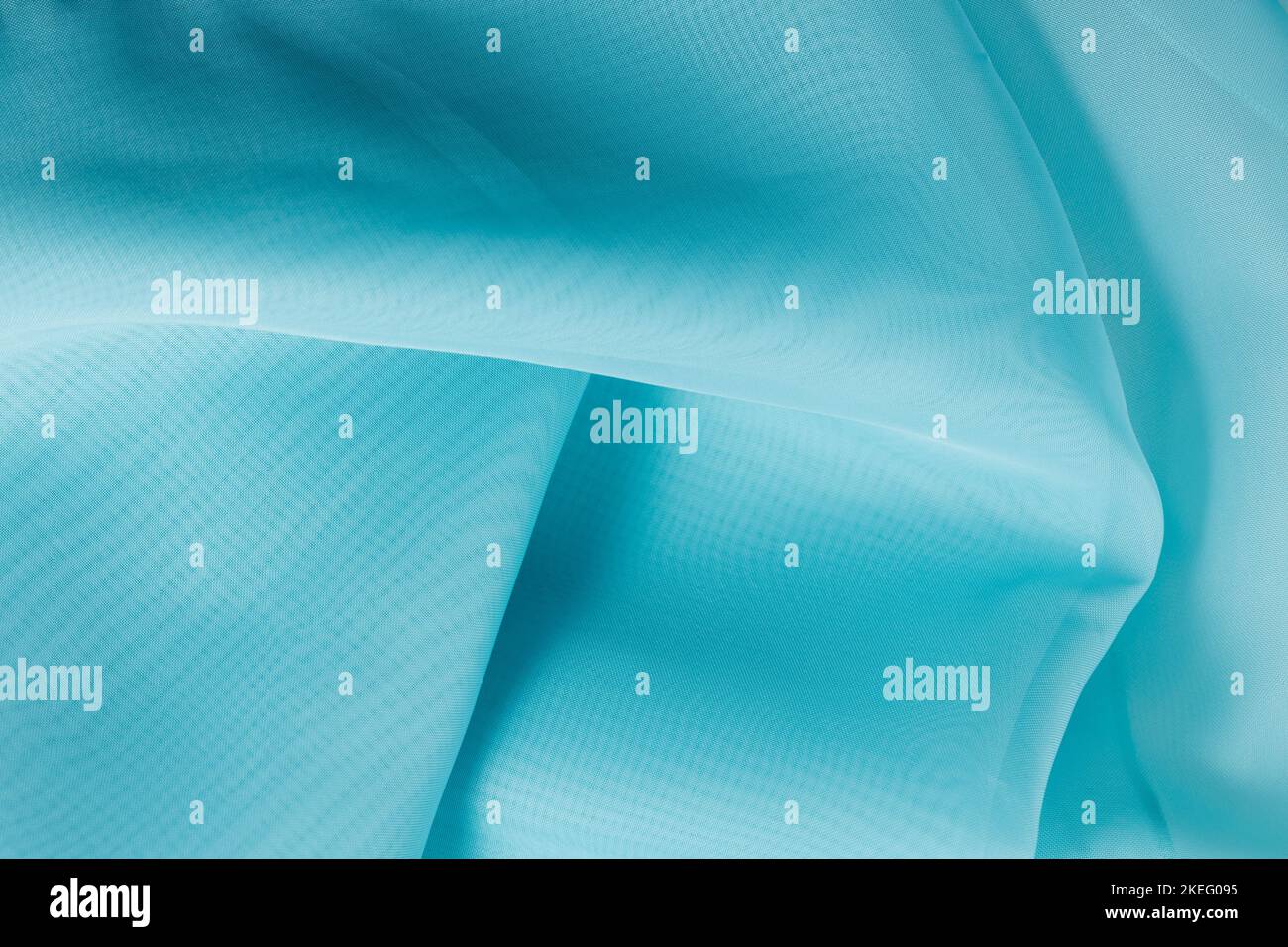 blue silk fabric. wavy fabric texture Stock Photo - Alamy
