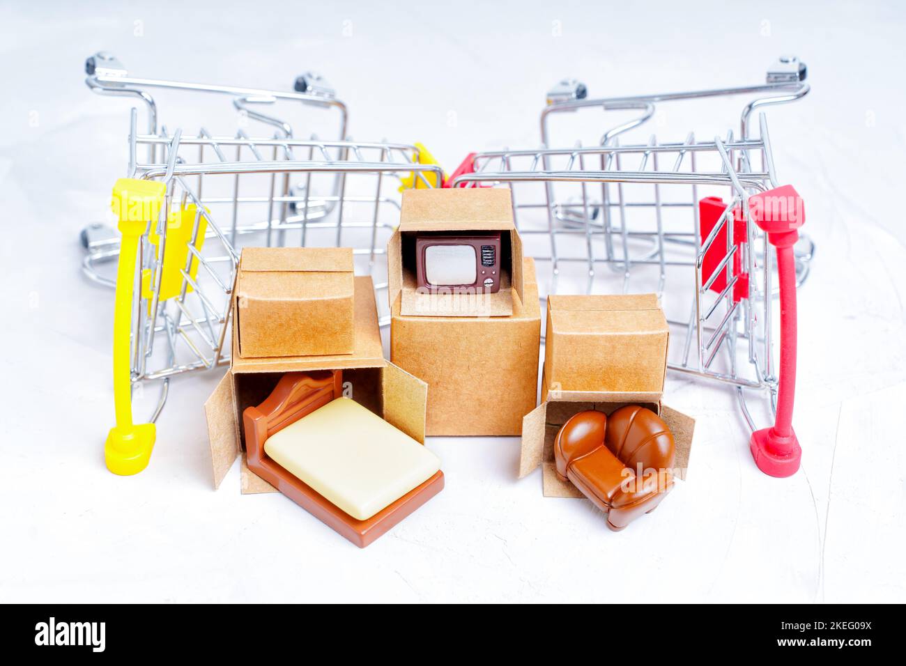 Unpacked tiny delivery boxes with miniature furniture figurines by ...