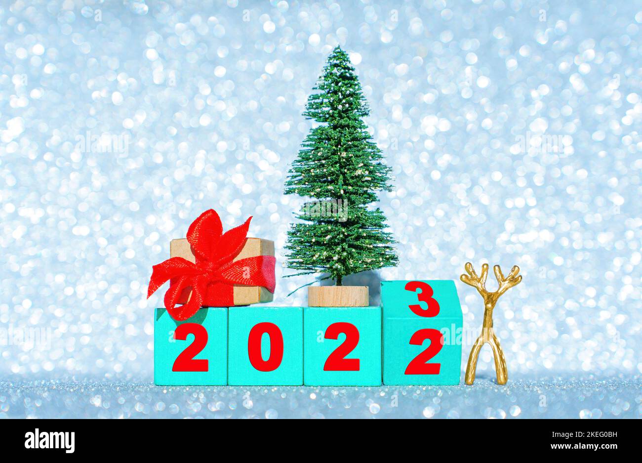 Transition from year 2022 to 2023: half flipped wooden block, toy ...