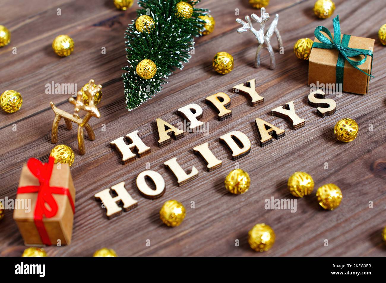 Happy Holidays lettering on a decorated Christmas background Stock ...