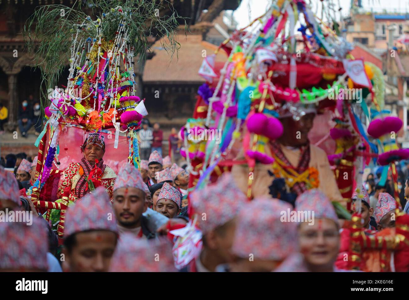 Nepal. 12th Nov, 2022. A elderly couple is carried by their relatives ...