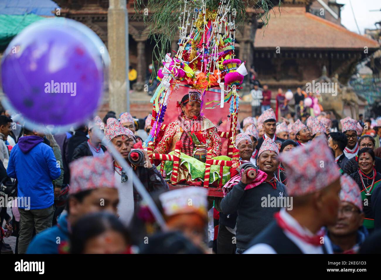 Nepal. 12th Nov, 2022. A elderly couple is carried by their relatives ...