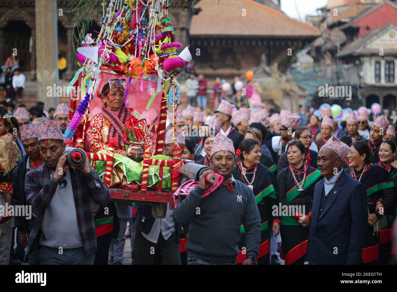 Nepal. 12th Nov, 2022. A elderly couple is carried by their relatives ...