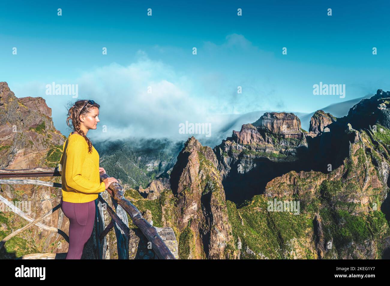 Description: Hiker enjoying the mountain scenery of Pico Ruivo from a ...